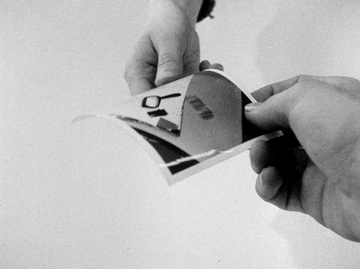 "With Photos..." - Ken Feingold - The Film-Makers' Cooperative